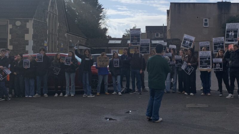 Protest held outside venue hosting event with David Miller