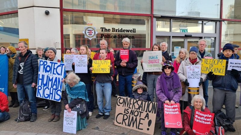Bristol Quakers hold vigil protesting police raid